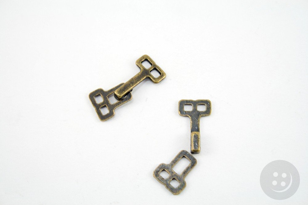 Metal clothing fastening antique brass